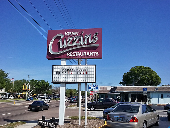 The iconic red Kissin' Cuzzins sign stands sentinel on 34th Street, a beacon of breakfast hope that's been guiding hungry St. Petersburg locals for decades.