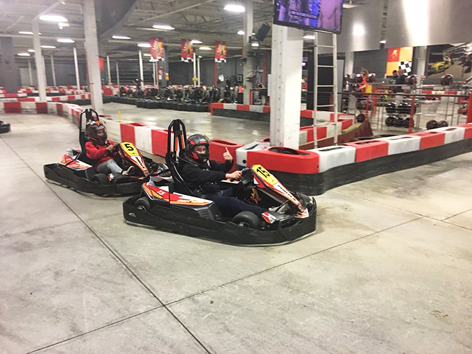 The unassuming exterior of High Voltage Indoor Karting hides the adrenaline-pumping paradise within, like finding a Ferrari engine inside a station wagon.
