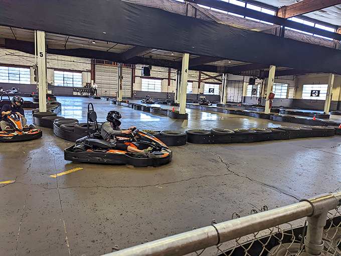 The ultimate playground for speed demons – a sprawling indoor track where rubber meets concrete and adult responsibilities temporarily disappear.
