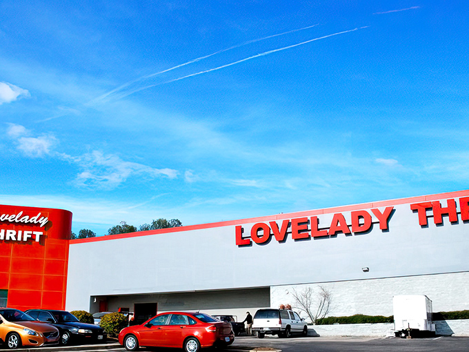 The iconic red and white exterior of Lovelady Thrift Store stands out against Alabama's blue sky like a beacon for bargain hunters everywhere.