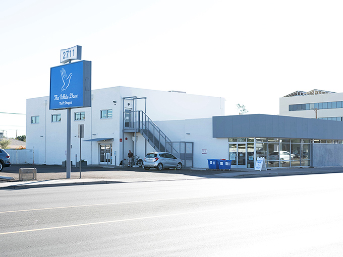 The blue and white exterior of White Dove stands like a beacon of bargain hope on Indian School Road, promising treasures within.