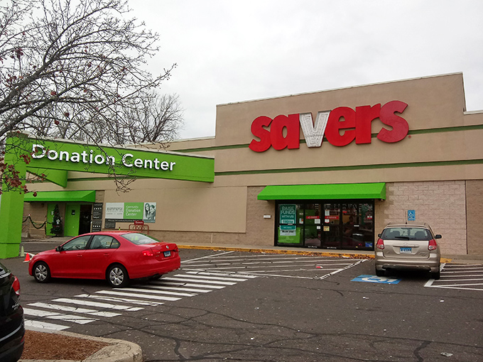 The iconic red Savers sign beckons like a lighthouse for bargain hunters. This unassuming exterior houses treasures waiting to be discovered by savvy Connecticut shoppers.