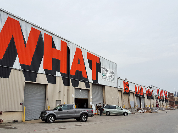 The giant "WHAT" emblazoned across this industrial facade isn't a question&mdash;it's the beginning of the treasure hunt that awaits inside Second Chance's massive warehouse.