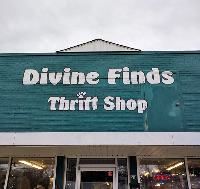 The teal storefront of Divine Finds stands like a portal to another era, inviting treasure hunters to step through and begin their journey.