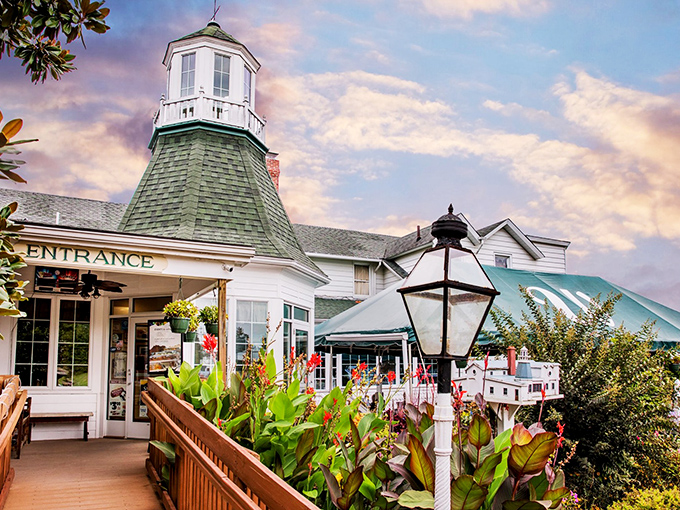The lighthouse-inspired cupola welcomes diners like a culinary beacon, promising delicious adventures against a backdrop of Maryland's dreamy sunset skies.