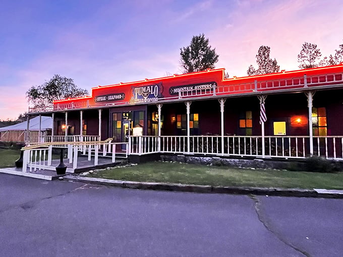 The red facade of Tumalo Feed Co. stands like a Western mirage against the Oregon sky, beckoning hungry travelers with promises of carnivorous delights.