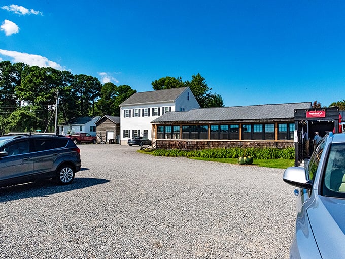 The unassuming exterior of Merroir belies the culinary magic within. Like finding a Michelin star in someone's backyard&mdash;complete with gravel parking that says "we care about food, not frills."