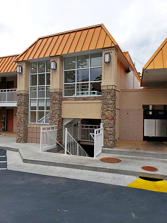 The welcoming entrance to Myrtie Mae's promises Ozark hospitality before you even step inside. That copper roof practically winks at you on sunny days.