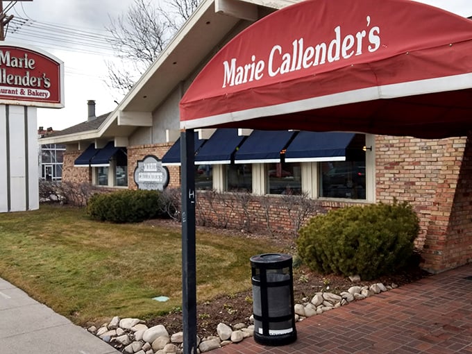 The iconic red awning beckons like a culinary lighthouse, promising comfort food salvation after a long day of Utah adventures.