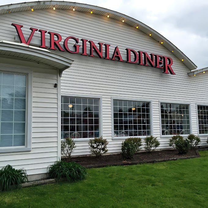 The iconic white exterior of Virginia Diner stands proudly against the sky, a beacon of comfort food that's been welcoming hungry travelers since 1929.