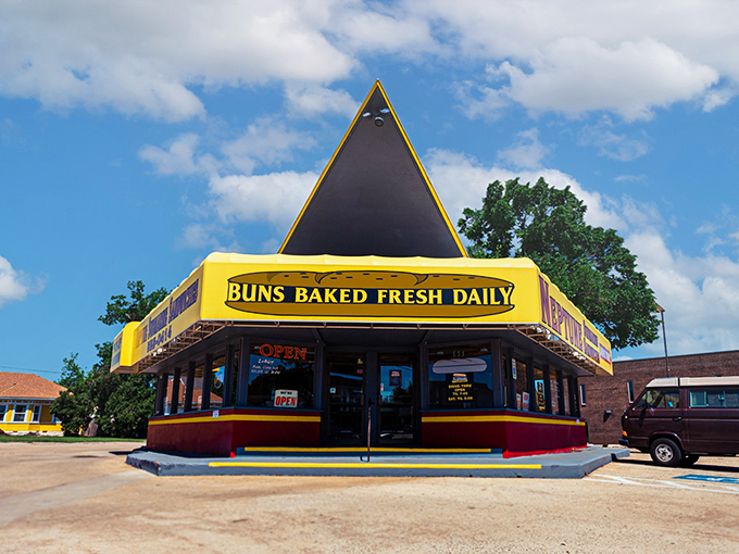 That iconic yellow fin-shaped roof isn't just architectural whimsy—it's a lighthouse for the sandwich-starved souls of Oklahoma City.