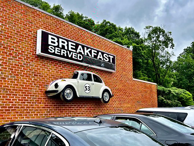 The iconic white Beetle #53 mounted on Herbie's brick exterior isn't just decoration&mdash;it's a beacon calling hungry travelers home to breakfast, served 24/7.