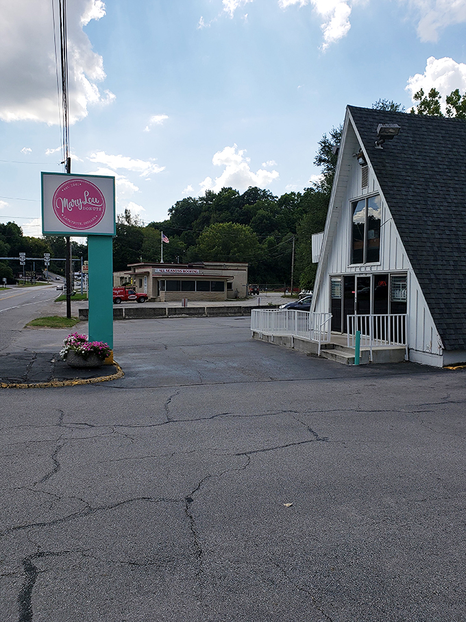 The iconic A-frame building of Mary Lou Donuts stands like a sugary lighthouse, beckoning carb enthusiasts from miles around.