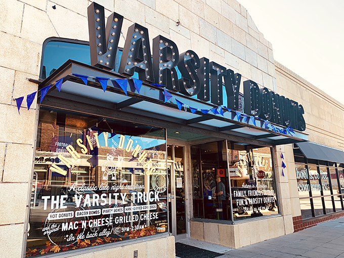 That pink neon sign isn't just announcing donuts&mdash;it's broadcasting joy to Aggieville. Like a beacon of sweetness on Manhattan's Moro Street.