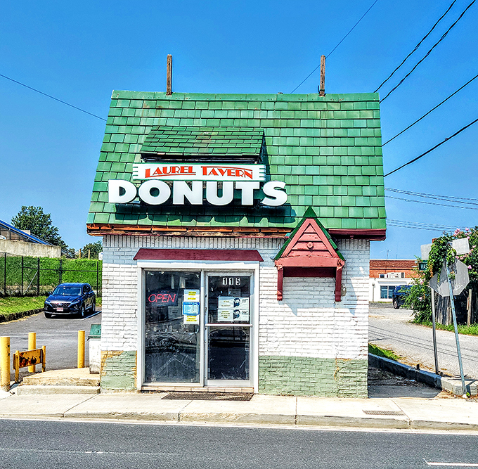 The little green-roofed donut shop that could! Laurel Tavern Donuts stands like a delicious time capsule on Washington Boulevard, beckoning sweet-toothed travelers.