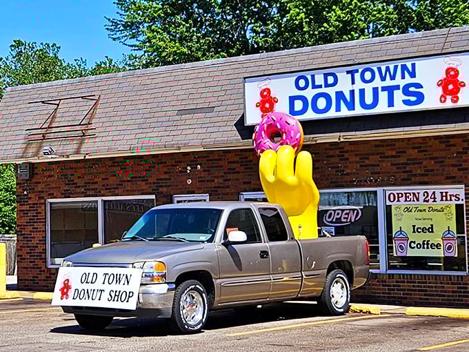 The iconic yellow hand holding a pink donut says it all &ndash; resistance is futile at this 24-hour temple of fried dough.