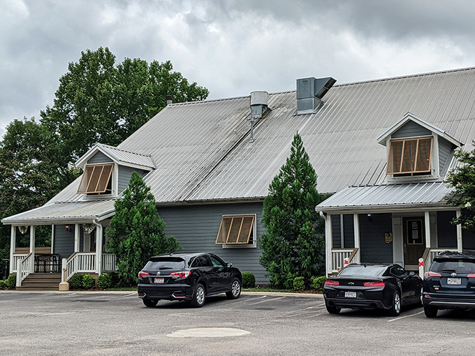 This charming building nestled among the trees houses a welcoming sports bar perfect for game day gatherings.