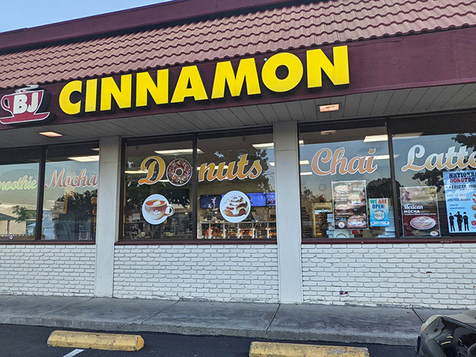 That bright yellow sign isn't just a beacon&mdash;it's a promise of pastry perfection waiting inside this unassuming Folsom strip mall gem.