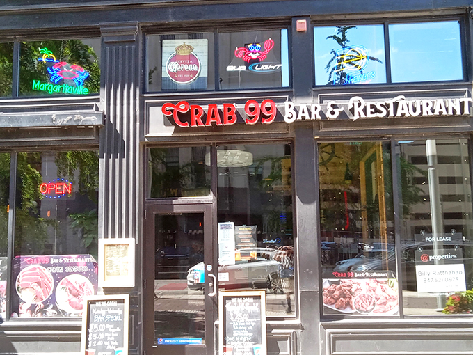 The glowing red sign of Crab 99 beckons like a lighthouse for seafood lovers lost in a landlocked state. Maritime salvation awaits inside.