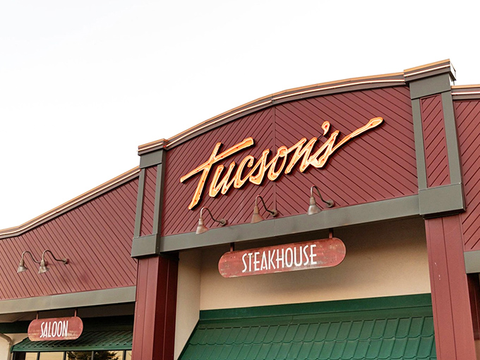The burgundy facade of Tucson's glows with promise, like a beacon calling to hungry travelers. Those illuminated signs aren't just decoration&mdash;they're a dinner invitation you can't refuse.