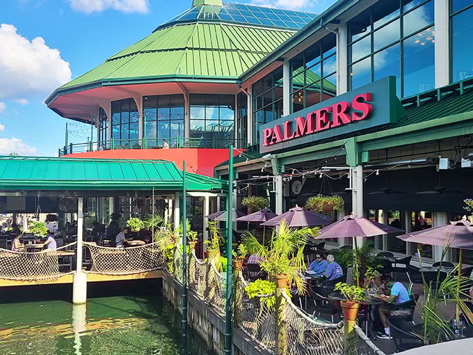 Palmer's waterfront patio feels like finding a coastal retreat in the heart of Kentucky. The green roof and lakeside seating create vacation vibes without the TSA pat-down.