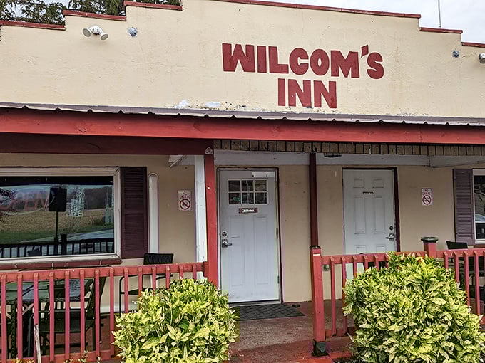 The unassuming exterior of Wilcom's Inn stands as a culinary speakeasy&mdash;proof that the best flavors often hide behind the simplest facades.