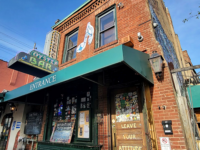 The iconic brick facade and neon sign welcome you like an old friend with a cheeky reminder to check your attitude at the door.