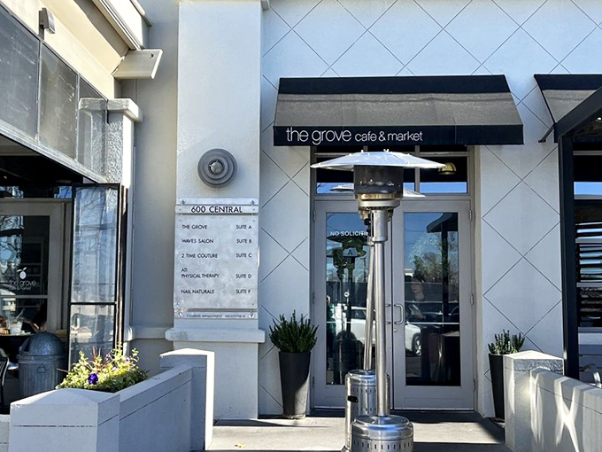 The Grove's unassuming exterior hides culinary treasures within, like finding a Michelin star restaurant disguised as your favorite aunt's house.