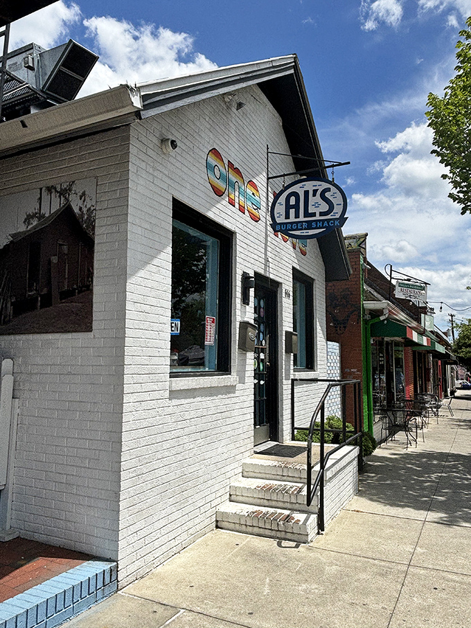 The modest white brick exterior of Al's belies the burger magic happening inside. Sometimes the greatest treasures hide in the plainest packages.