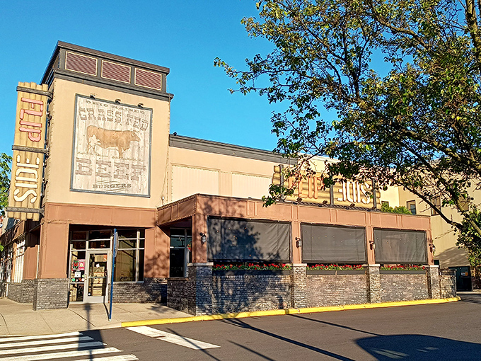 The wooden "FLIP SIDE" sign beckons like a lighthouse for the burger-obsessed. Those flower boxes aren't just pretty&mdash;they're a promise of good things to come.