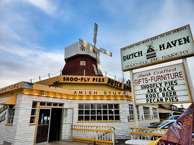 The iconic windmill-topped Dutch Haven stands proudly against Pennsylvania's blue sky, a beacon for pie pilgrims traveling Route 30 through Amish country.