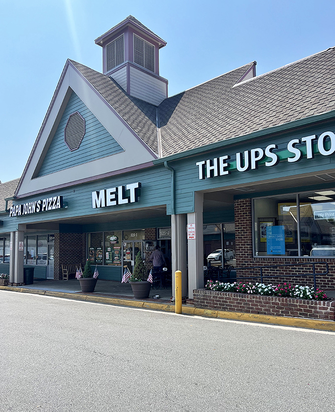 Hiding in plain sight between Papa John's and a UPS Store, this unassuming strip mall treasure proves that culinary greatness doesn't need fancy digs.