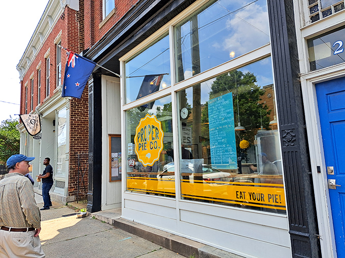 The blue door beckons like a portal to pie paradise. Proper Pie Co.'s charming storefront in Richmond's Church Hill neighborhood promises delicious adventures within.