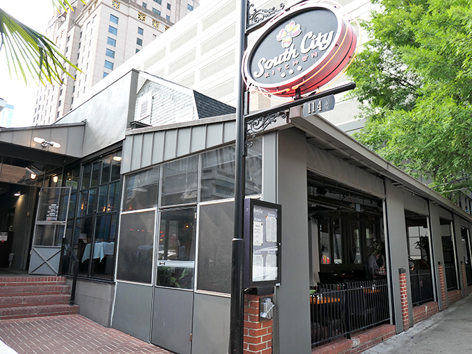 The understated exterior belies the culinary treasures within. Palm trees and a classic sign welcome you to this Atlanta institution.