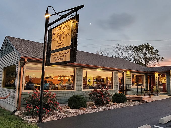 The unassuming seafoam green exterior of Metropolitan Steakhouse stands like a culinary speakeasy &ndash; modest on the outside, magnificent on the inside.