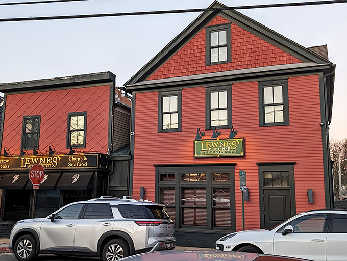 The unassuming exterior of Lewnes' Steakhouse in Annapolis hides a carnivore's paradise within. Classic diamond-patterned shingles and vintage awnings signal you've found the real deal.