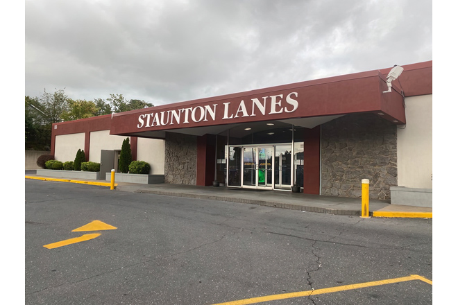 That iconic red sign against the Virginia sky is like a beacon calling all pin-seekers home. Staunton Lanes stands ready for your next strike.