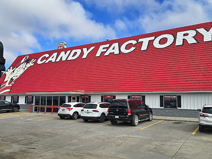 A candy lover's beacon on I-44, Redmon's iconic red roof and cartoon mascot promise sweet salvation just minutes from your sensible driving schedule.