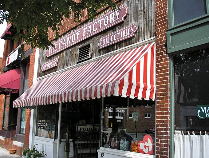 The iconic red-and-white striped awning beckons like a sugary lighthouse, guiding sweet-toothed sailors to this brick-fronted paradise in downtown Lexington.