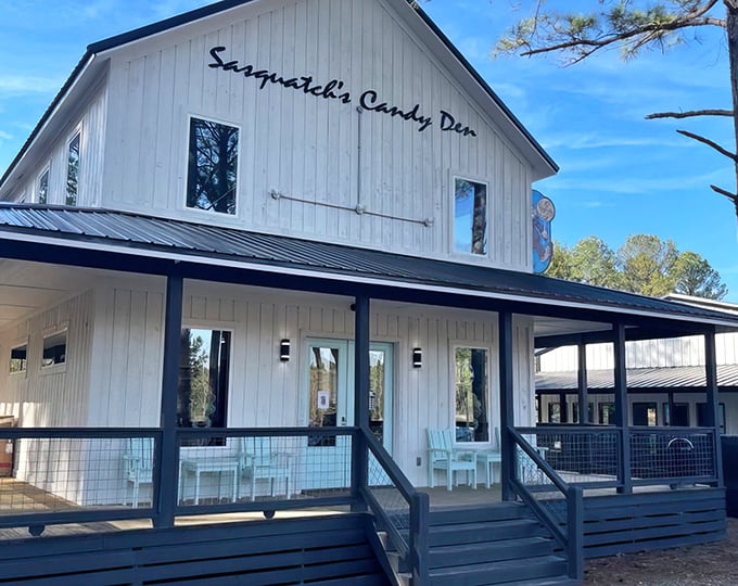 The white clapboard sanctuary of sweetness stands proudly among the pines, with its cartoon Sasquatch mascot clutching a lollipop like it's Olympic gold.