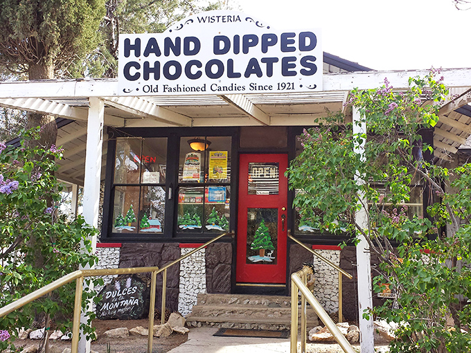 The storybook cottage of your sugar-coated dreams beckons with that iconic red door. Wisteria's exterior has been tempting sweet-toothed travelers since the Roaring Twenties.