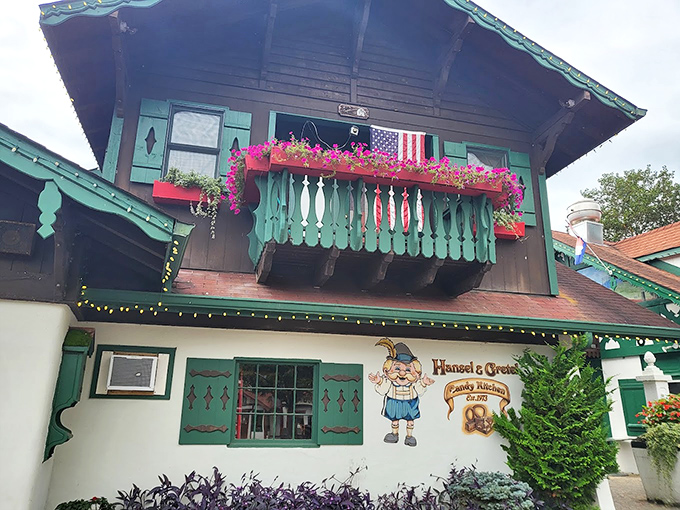 The storybook comes to life! Hansel & Gretel's Bavarian-style exterior perfectly captures Helen's Alpine charm, complete with green shutters and whimsical character art.