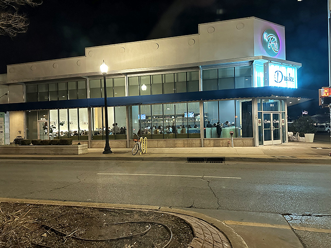 The Drake's sleek Art Deco exterior stands proudly at the corner of NW 23rd and Walker, a beacon of culinary sophistication in Oklahoma City's Uptown district.