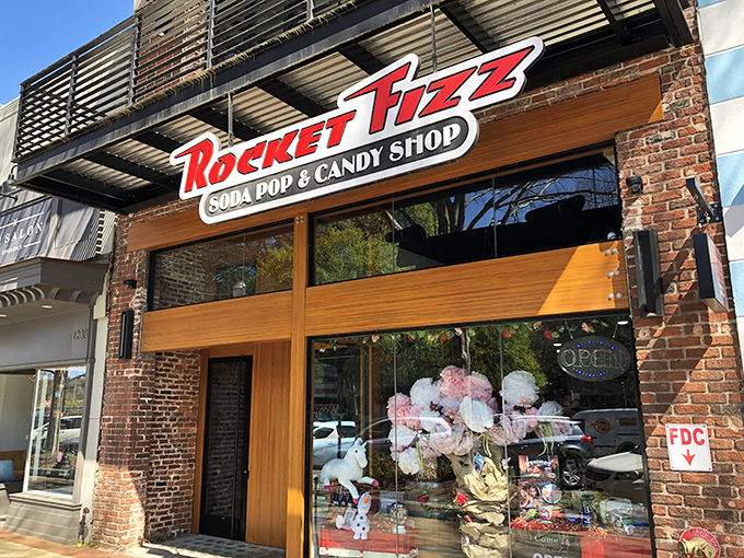The brick storefront of Rocket Fizz beckons like a portal to childhood, its colorful signage promising a sugar-fueled adventure within Columbus's revitalized downtown.