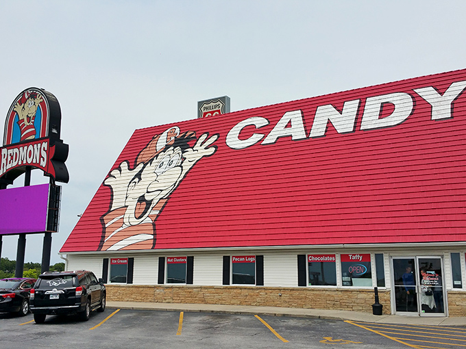 A candy lover's beacon on I-44, Redmon's iconic red roof and cartoon mascot promise sweet salvation just minutes from your sensible driving schedule.