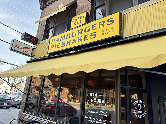 The iconic yellow awning of Hamburg Inn No. 2 beckons hungry travelers like a culinary lighthouse on Linn Street. Democracy and breakfast, served daily.