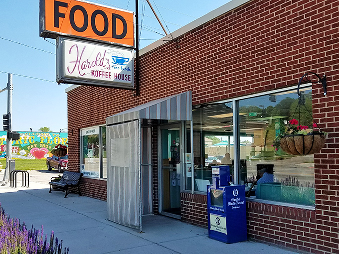 That orange "FOOD" sign might be the most honest advertising in America. No frills, just promises kept at Harold's Koffee House. 