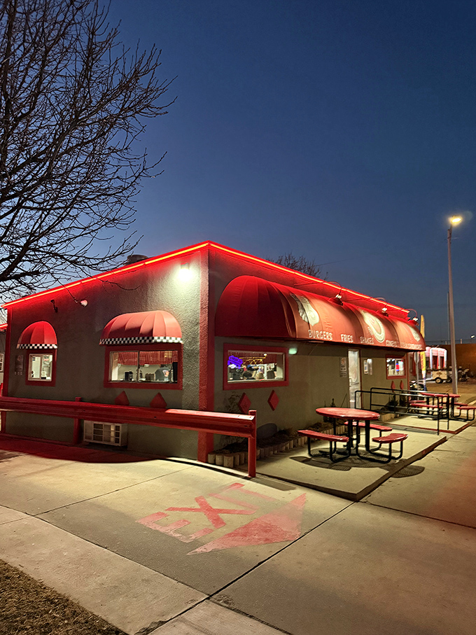 Route 66 nostalgia wrapped in a bright red awning. Sid's exterior promises simple pleasures that have stood the test of time.