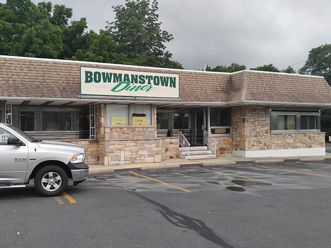The exterior's stone facade and classic green signage stand as Pennsylvania's answer to the Bat Signal - comfort food headquarters.