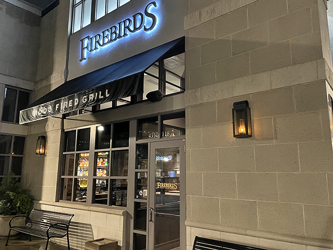 The blue glow of Firebirds beckons like a lighthouse for the hungry. At night, its warm exterior promises culinary adventures await inside.